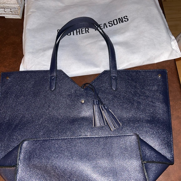 Neiman Marcus | Bags | Neiman Marcus Dark Blue Tote With Tassel Accents ...